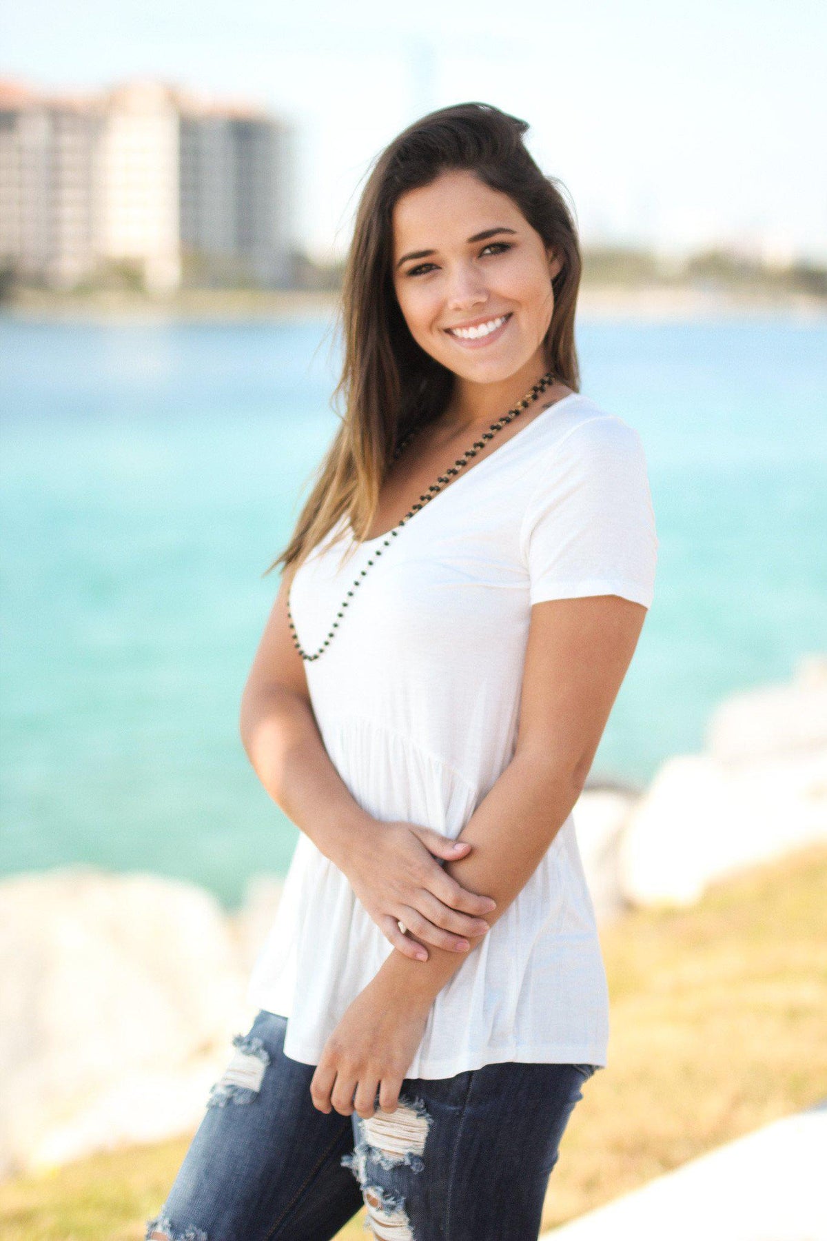 Ivory Top with Ruffle Bottom | Cute Tops – Saved by the Dress